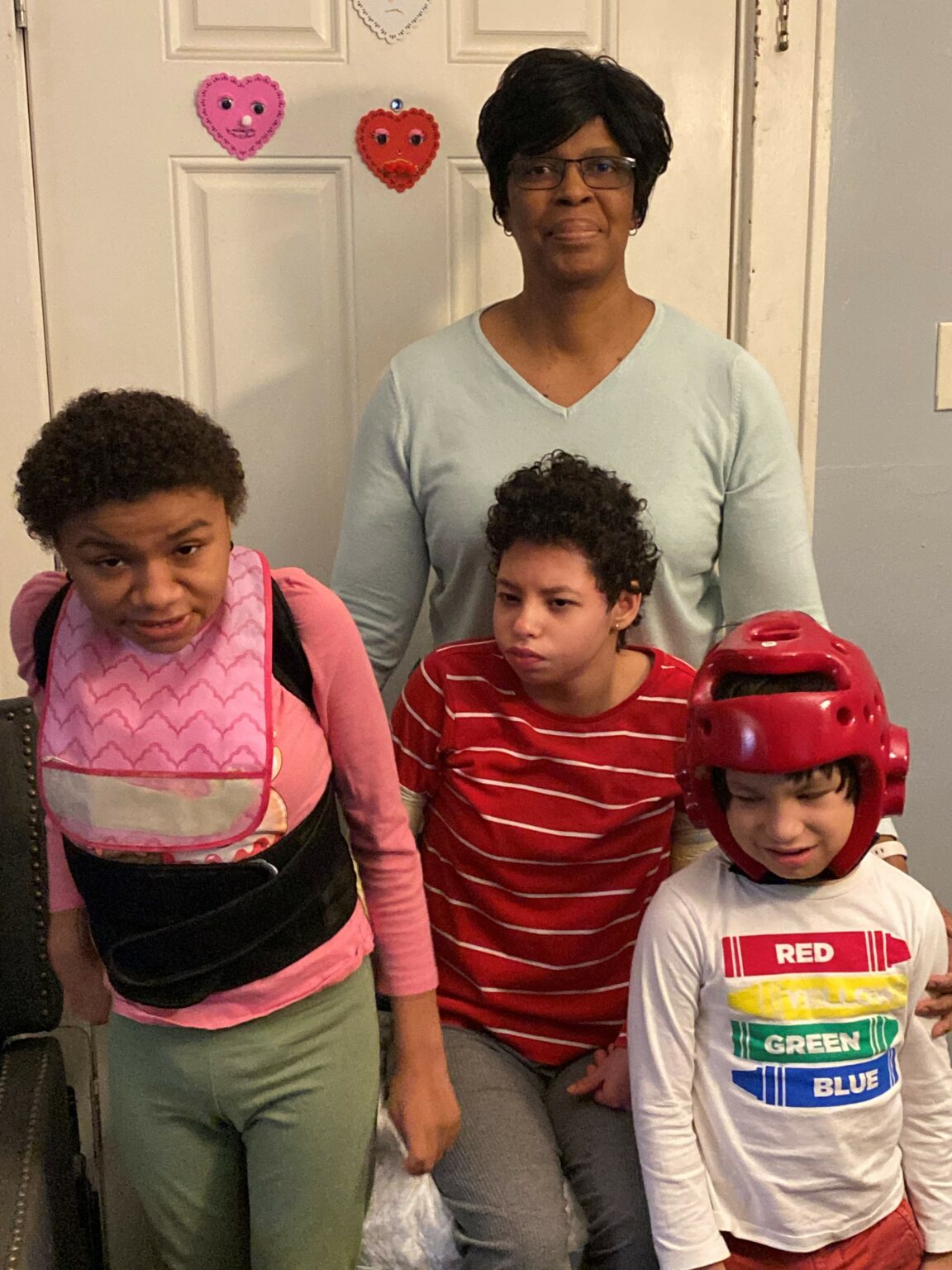 Retiree creates her dream family adopting special-needs children - FCBDD